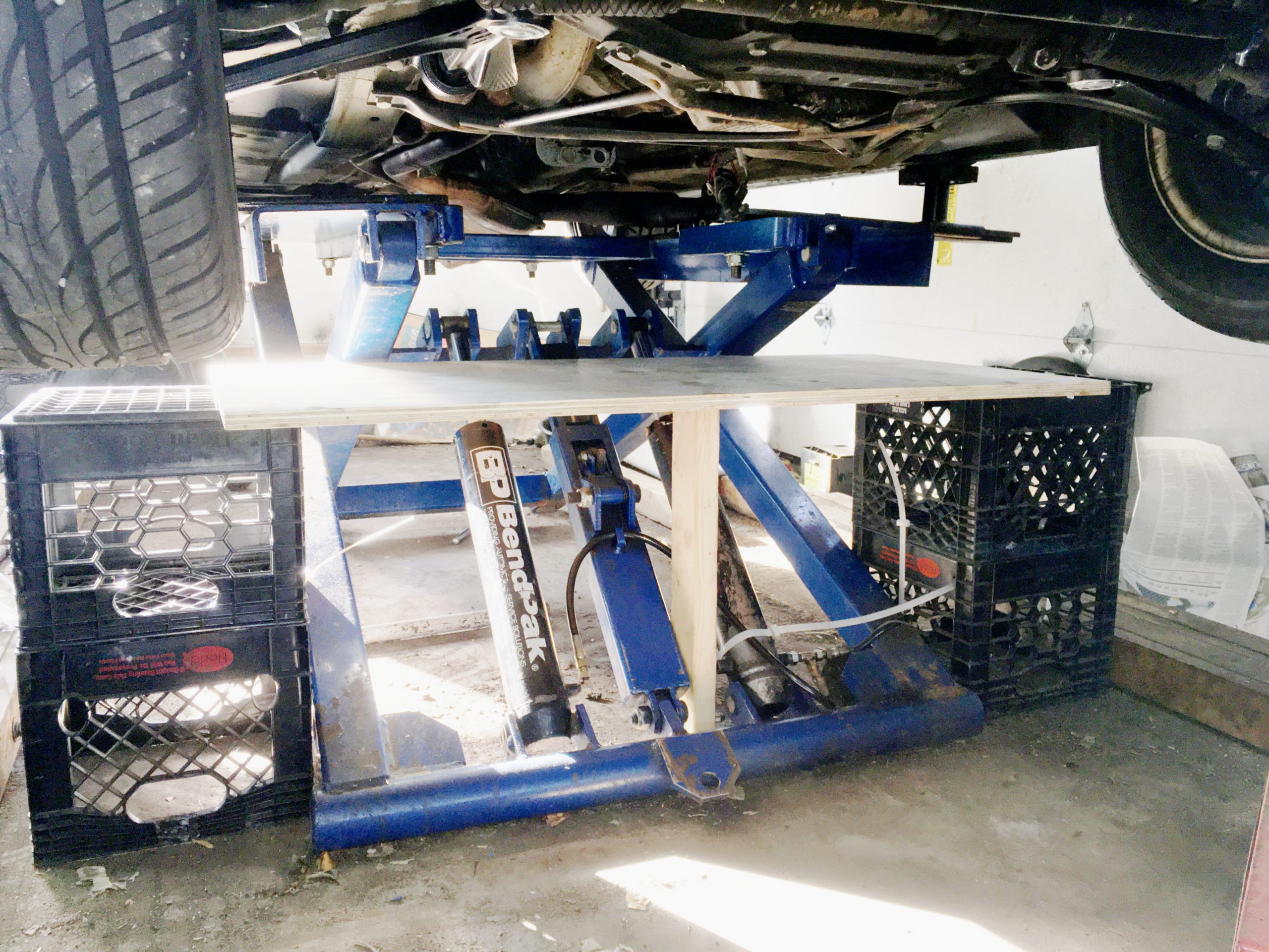 Removing a transmission on a mid-rise lift - Hagerty Media