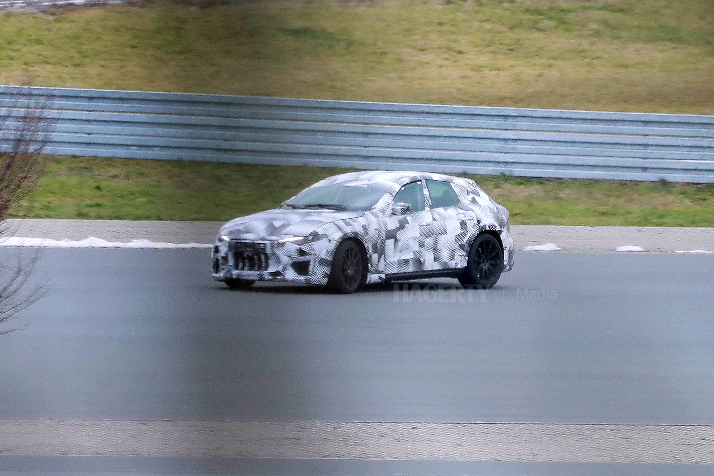 Spied: Ferrari SUV test mule dons slammed Levante bodywork - Hagerty Media