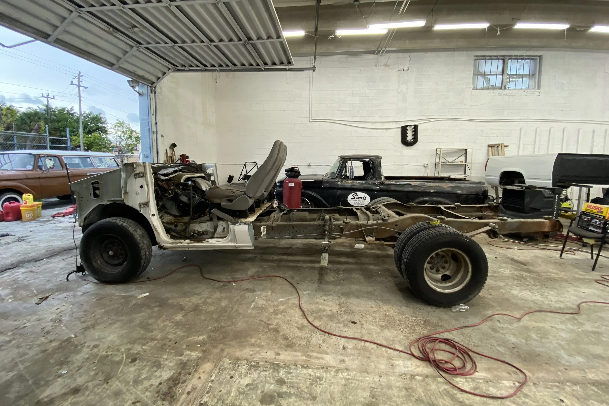 Watch this E350 Ford van get hacked down for a pickup chassis swap ...