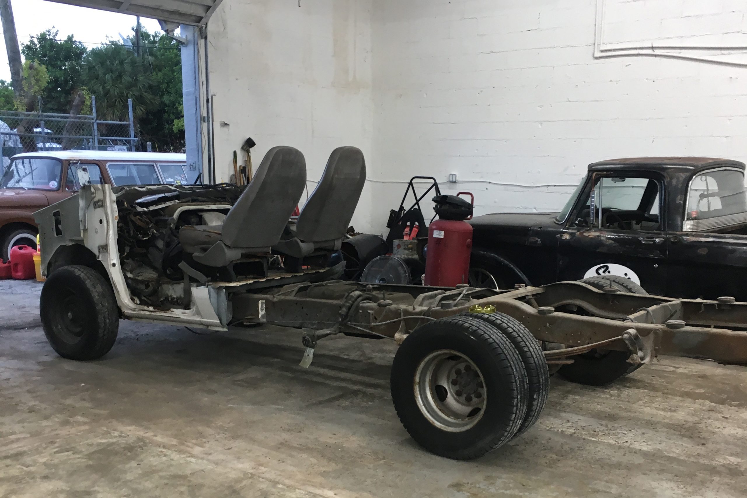 Watch this E350 Ford van get hacked down for a pickup chassis swap ...