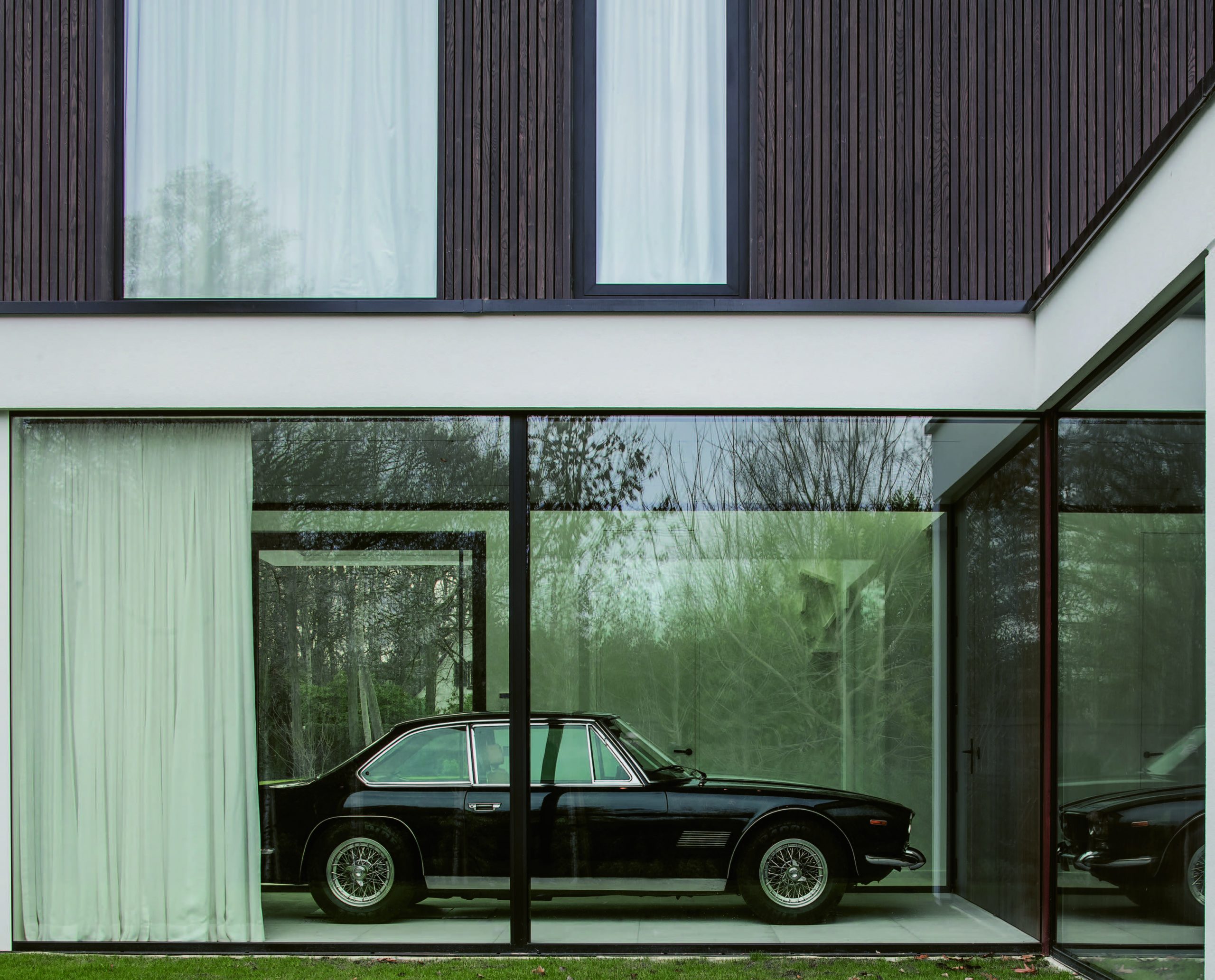 The intersection of cars and architecture is where we'd love to live ...