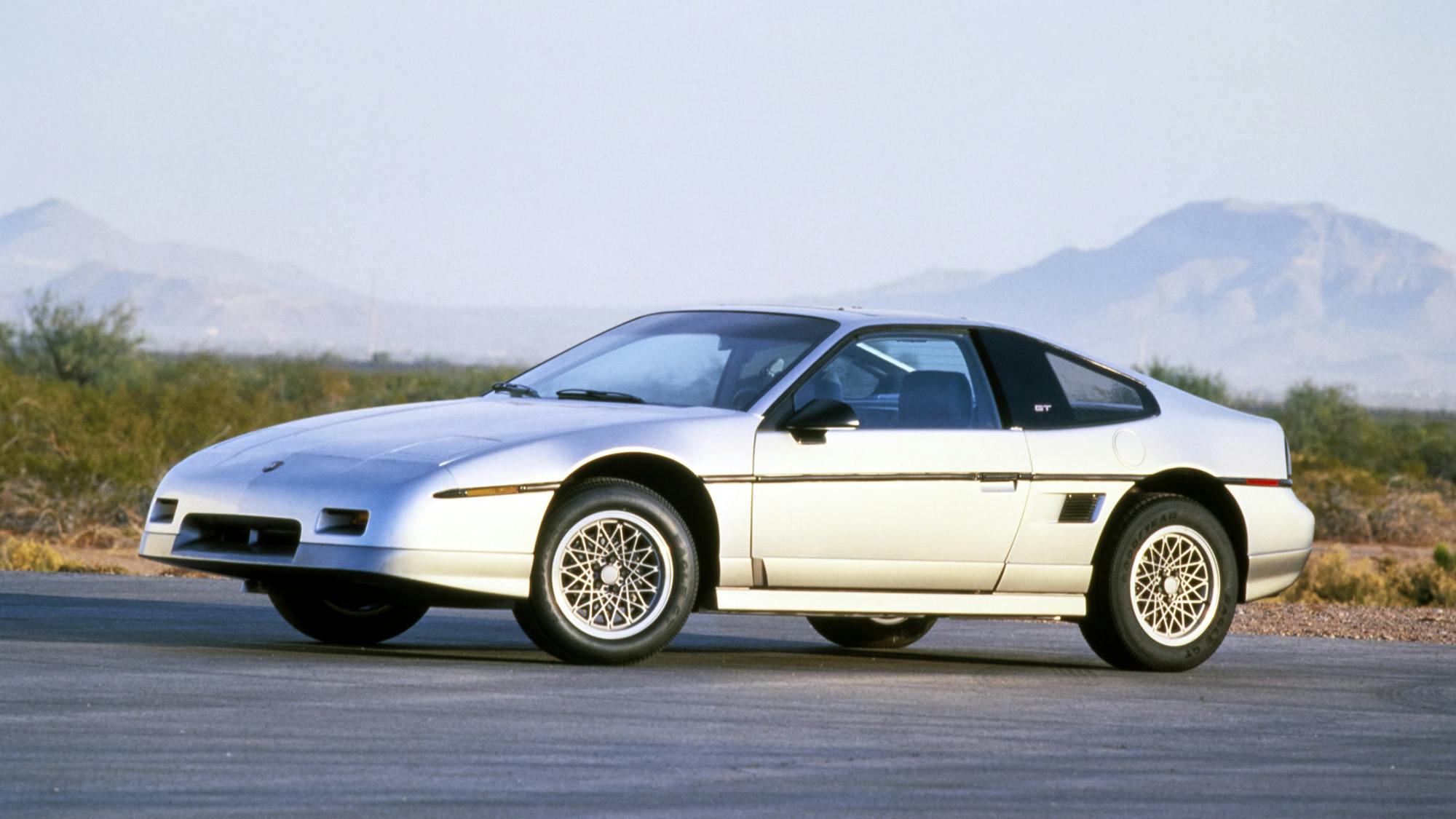 MR2 or Fiero? Choose your mid-engine ’80s fighter ... while it’s cheap ...