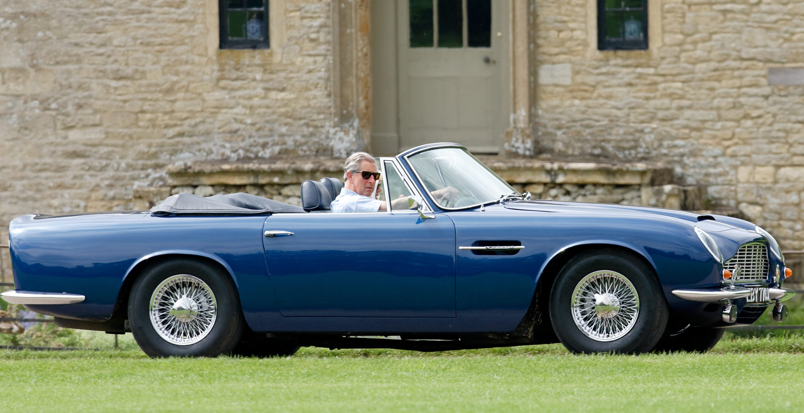 The new King of England drives an Aston Martin running on wine and ...