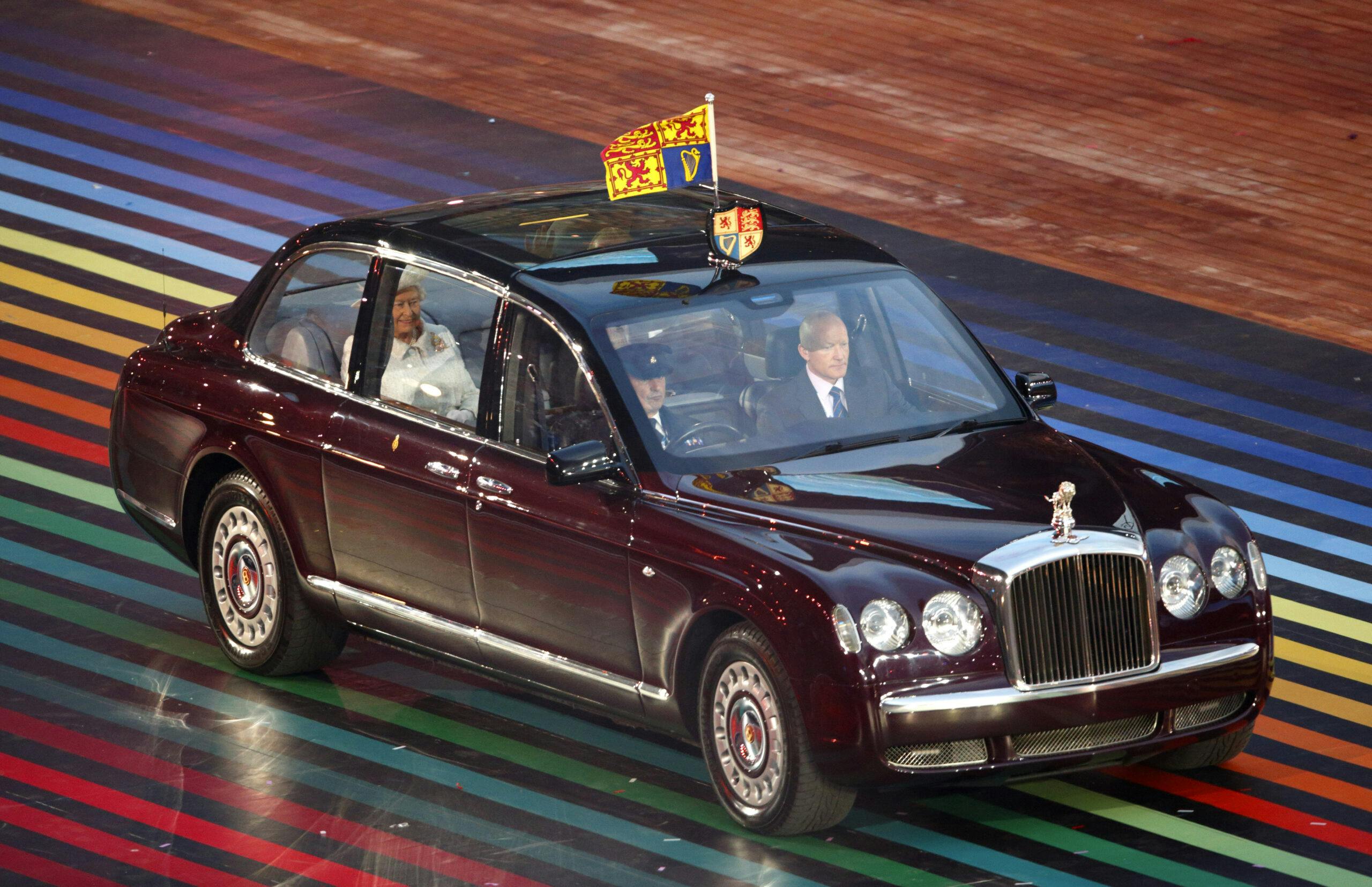 The new King of England drives an Aston Martin running on wine and ...