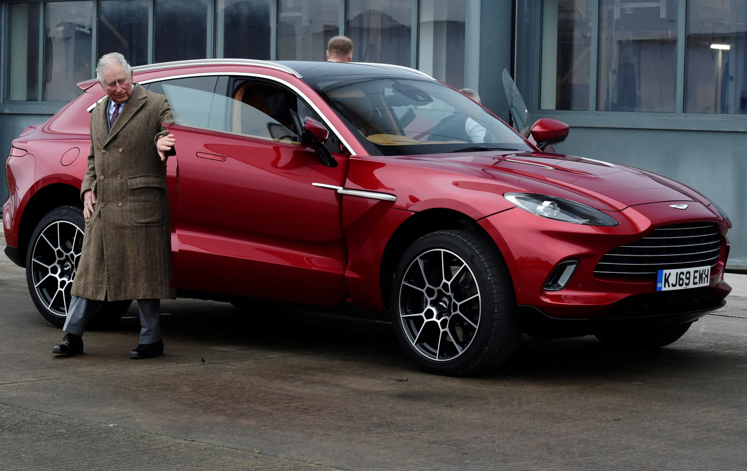 The new King of England drives an Aston Martin running on wine and ...