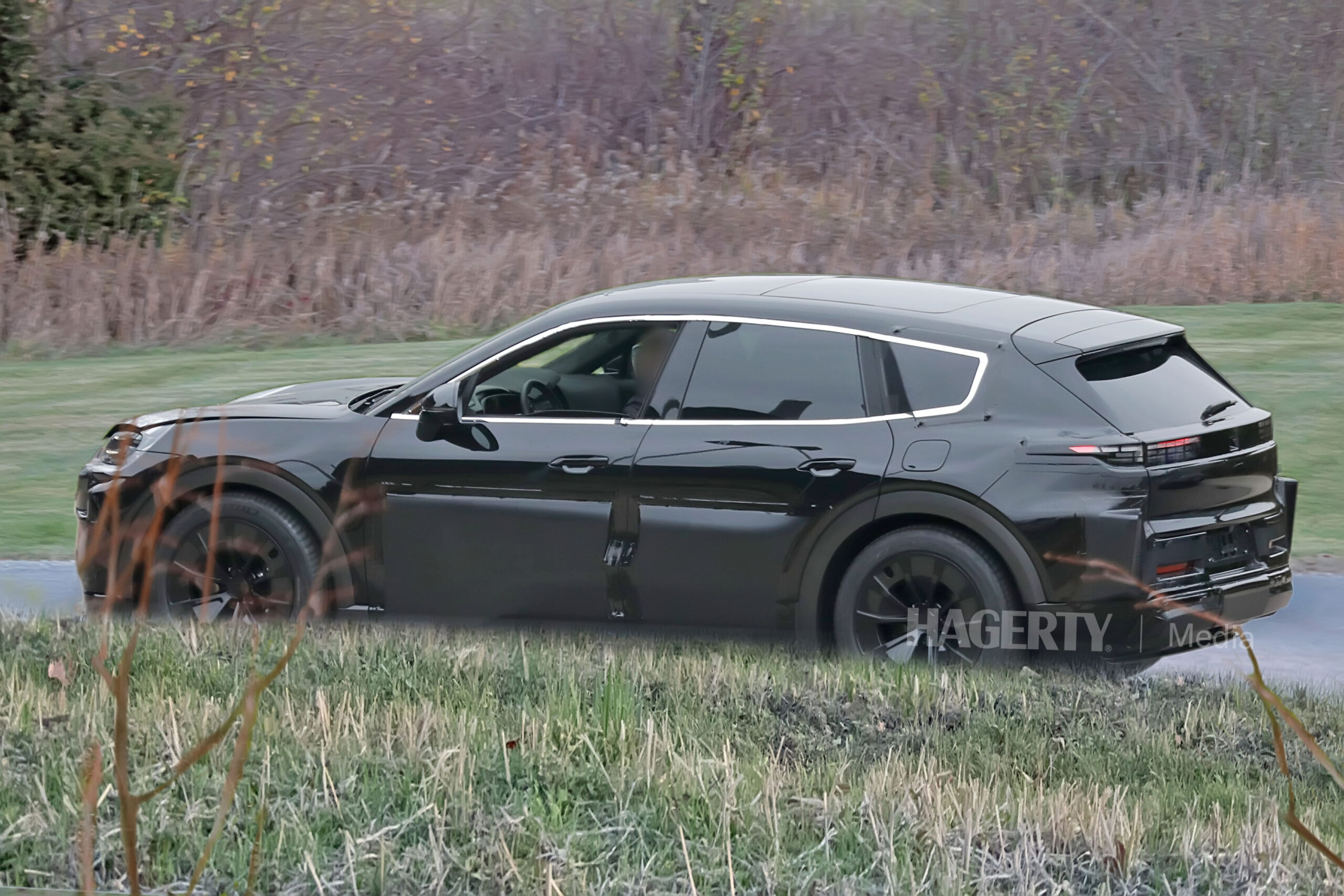 Is This Prototype Our First Look at Porsche's Forthcoming 7-Seat SUV ...