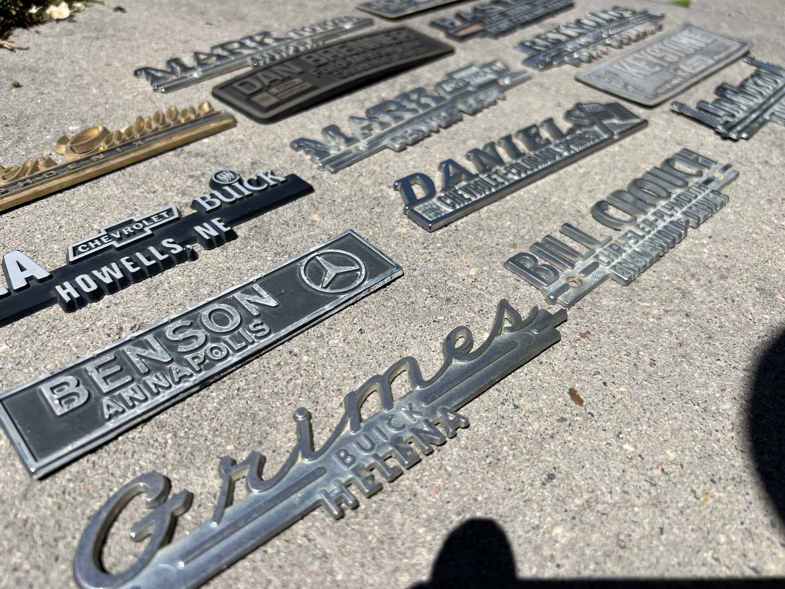 Vintage Dealership Badges and License Plate Frames Are the Ultimate ...