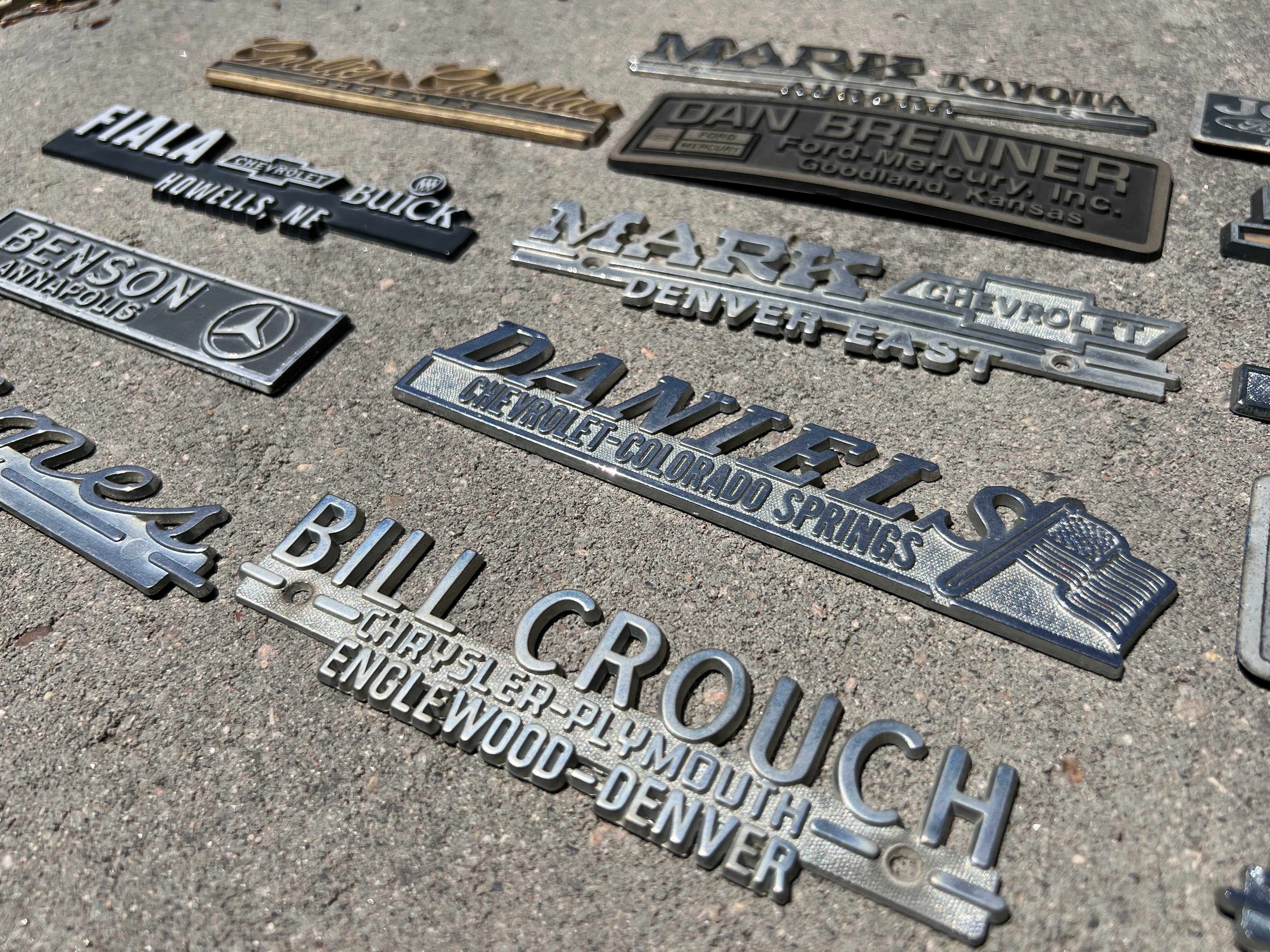 Vintage Dealership Badges and License Plate Frames Are the Ultimate ...
