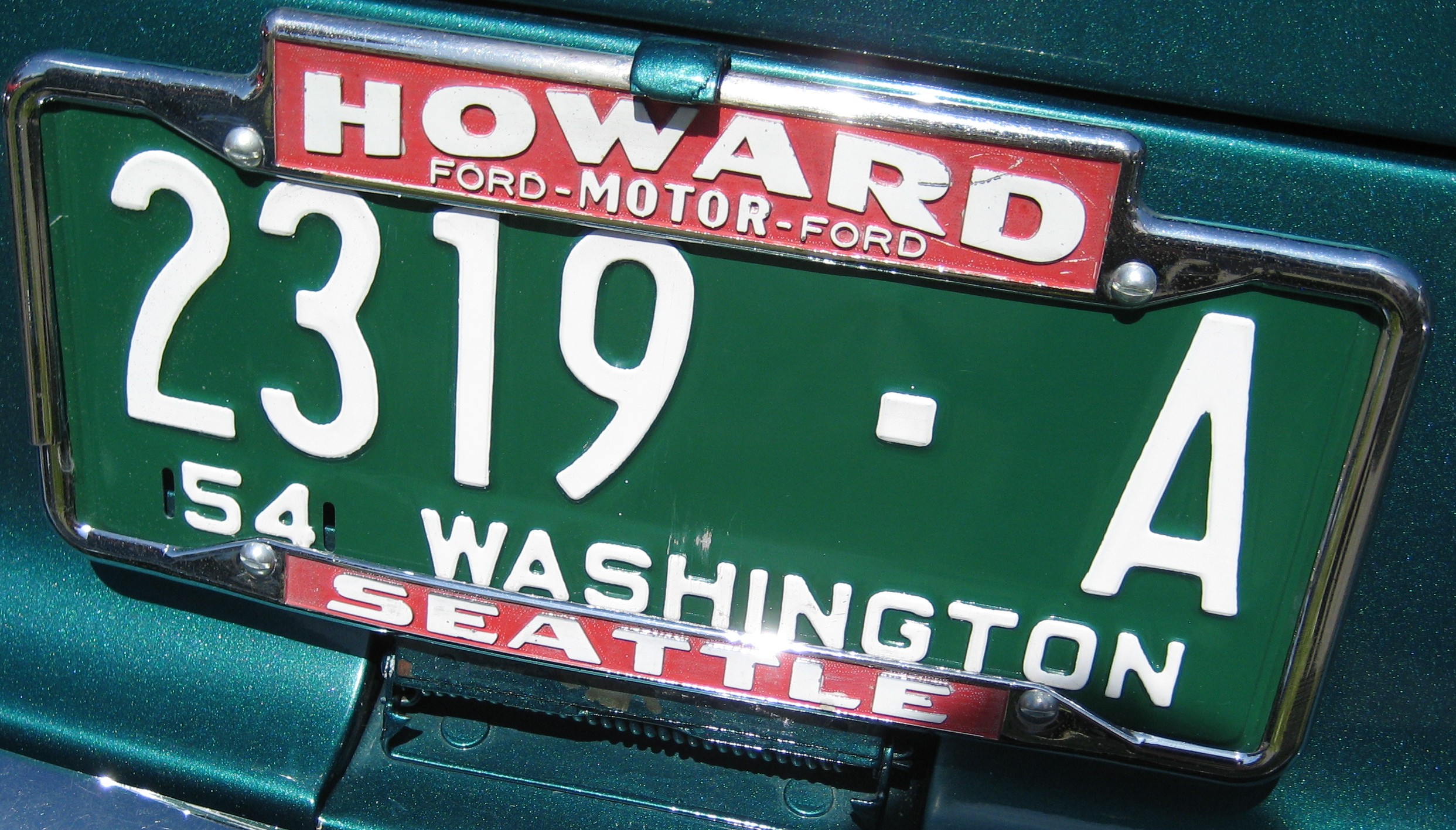 Vintage Dealership Badges and License Plate Frames Are the Ultimate ...