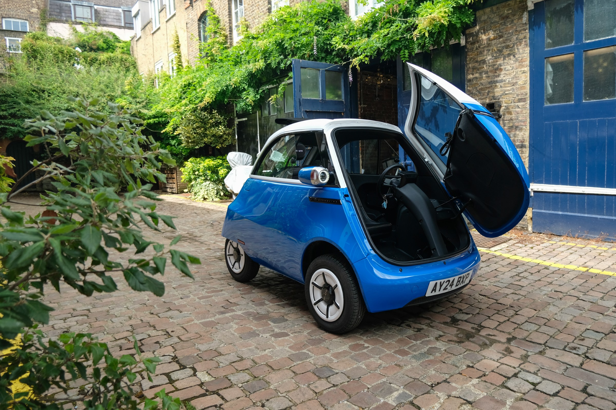 First Drive: The 2025 Microlino Is a Euro-Friendly EV with Throwback ...